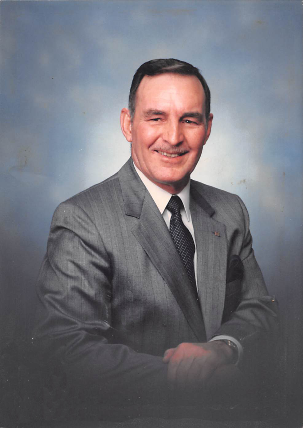 John E. Cooper | Orange Leader