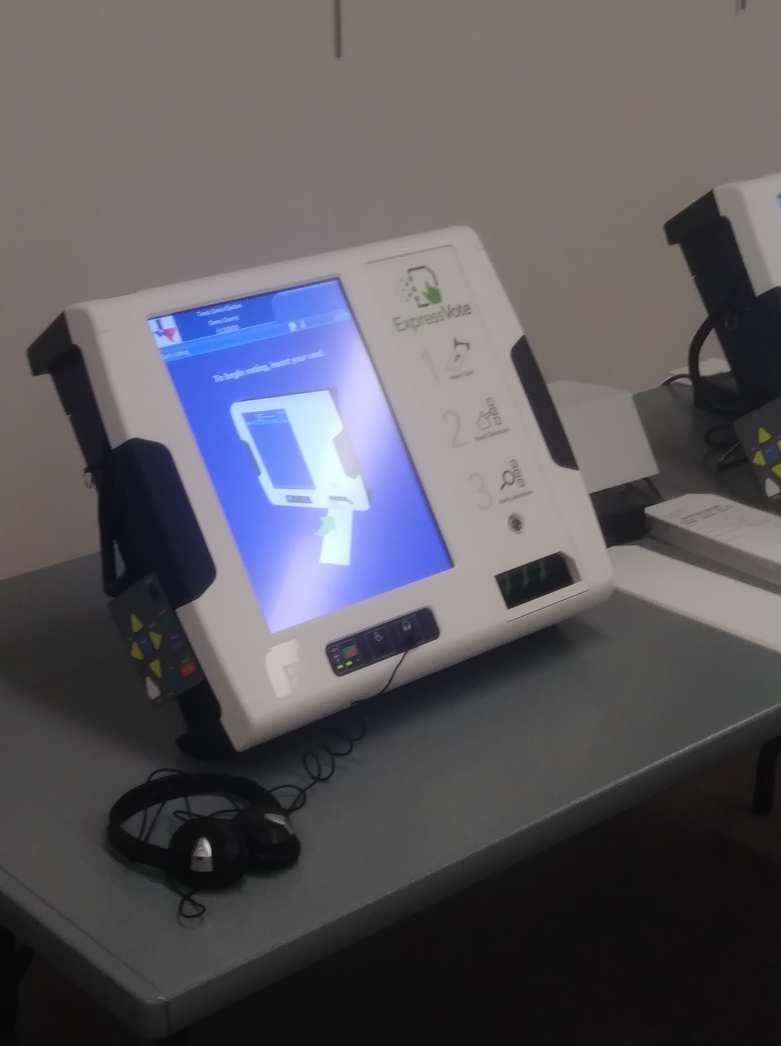 County shows off new voting machines - Orange Leader | Orange Leader