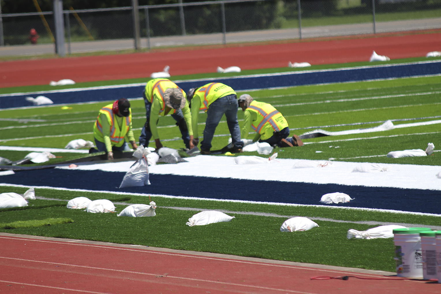 Turf nearing completion at Hooks Stadium; sidelines getting a new-look ...