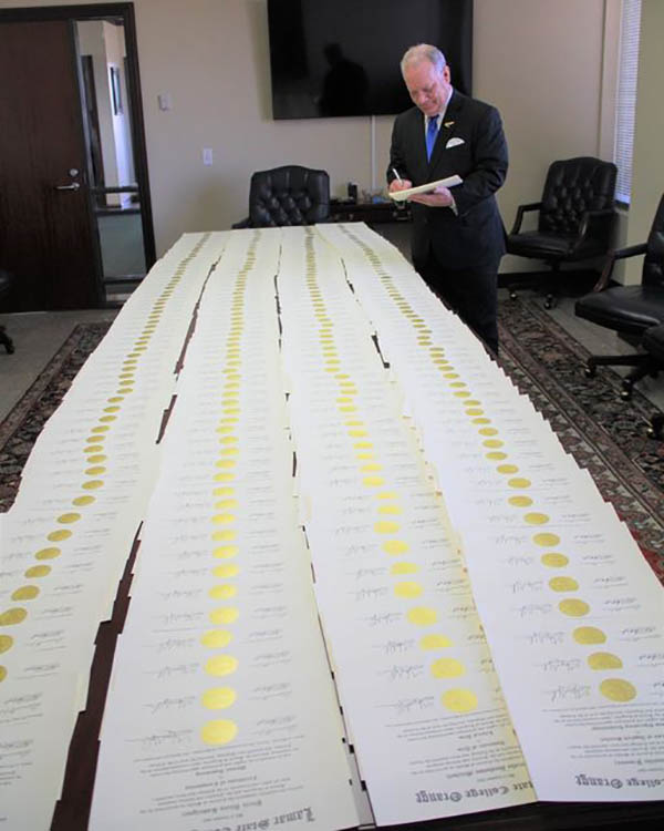 Dr. Johnson signs diplomas at LSCO - Orange Leader | Orange Leader